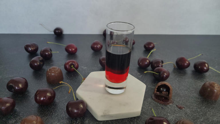 Easy layered Chocolate Covered Cherry Shot Recipe