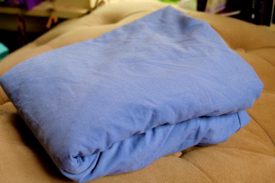 Folding Your Fitted Sheets Is Easier Than You Think -- Just Try This Trick