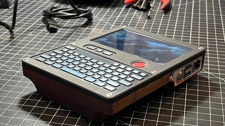 This classy Raspberry Pi cyberdeck uses a hardwood case, and I'm really ...