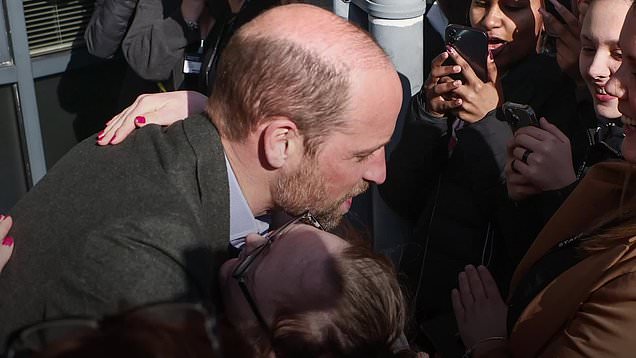 Prince William gives student Natasha Gorry a hug at Bournemouth and ...