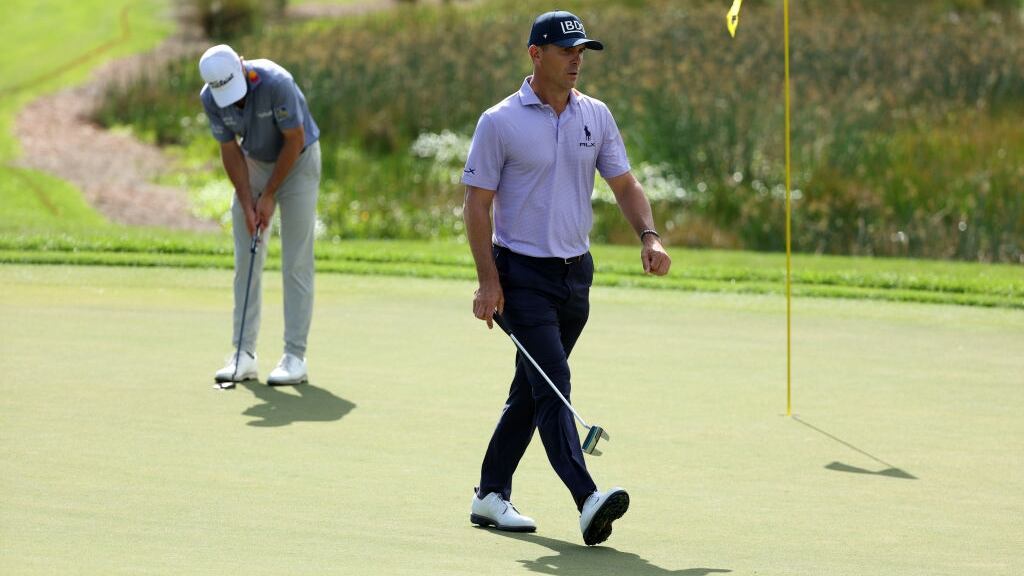 Golfer Billy Horschel shoos off gator with golf club during PGA match
