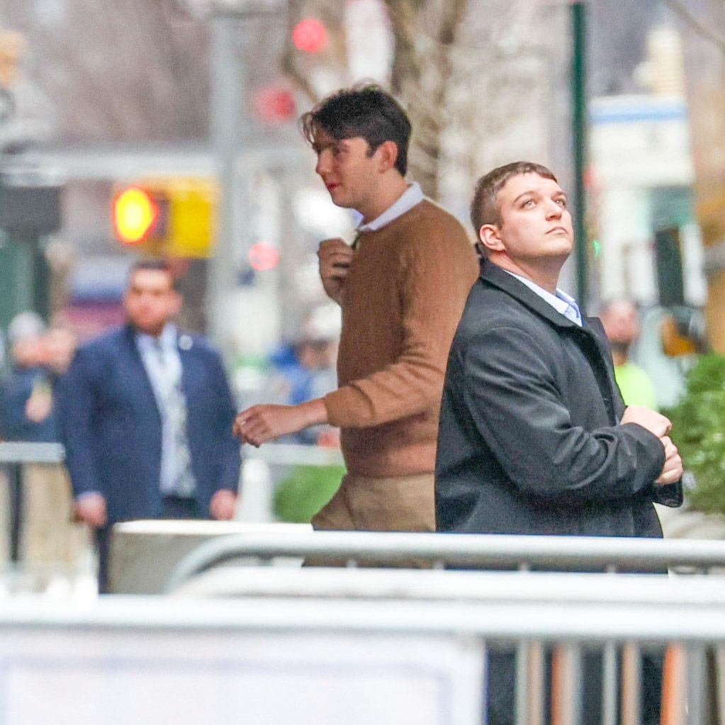 Barron Trump embraces classic college style in a knit sweater at NYU