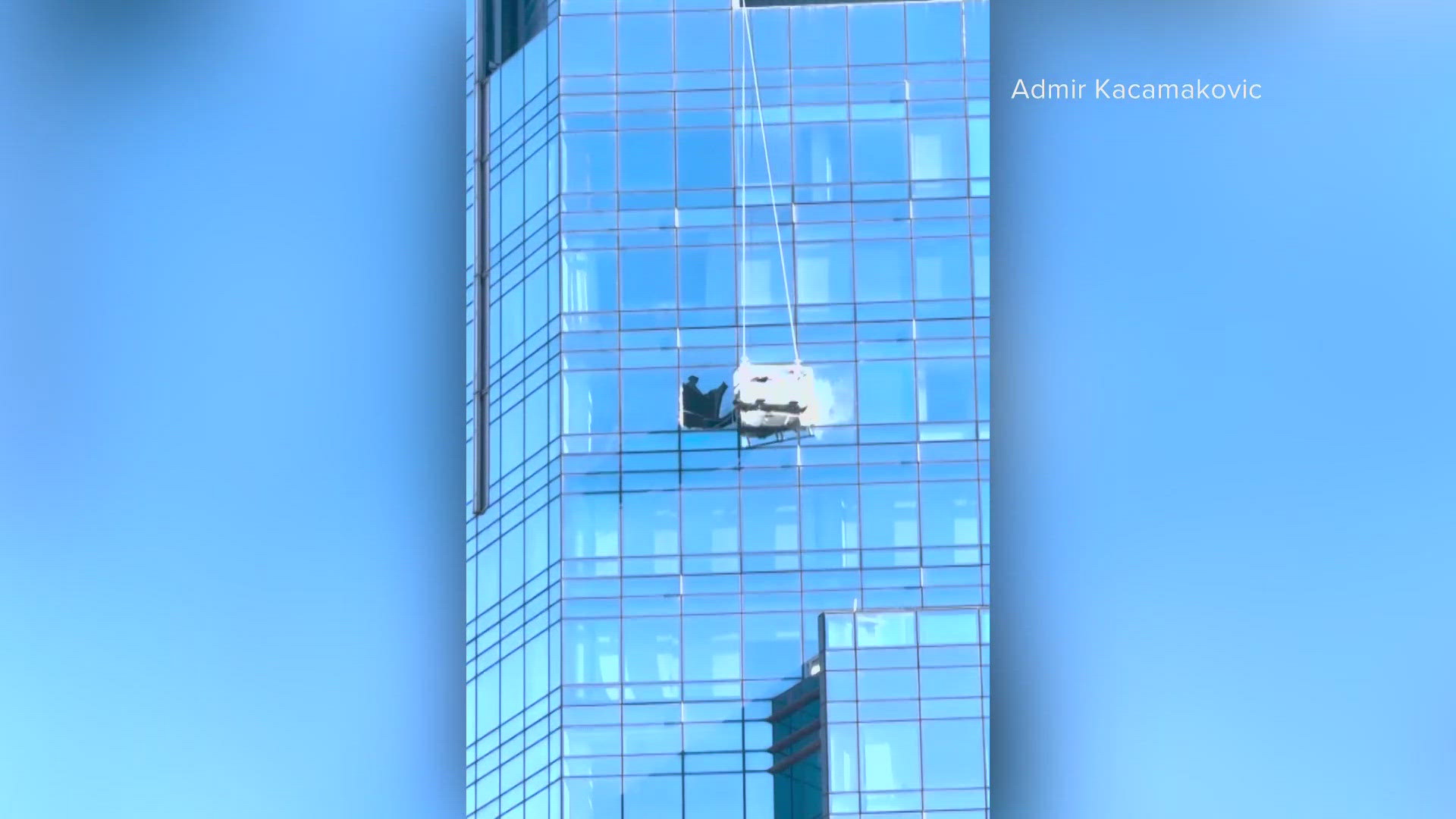 Window washers rescued after rigging swings out of control outside NYC ...