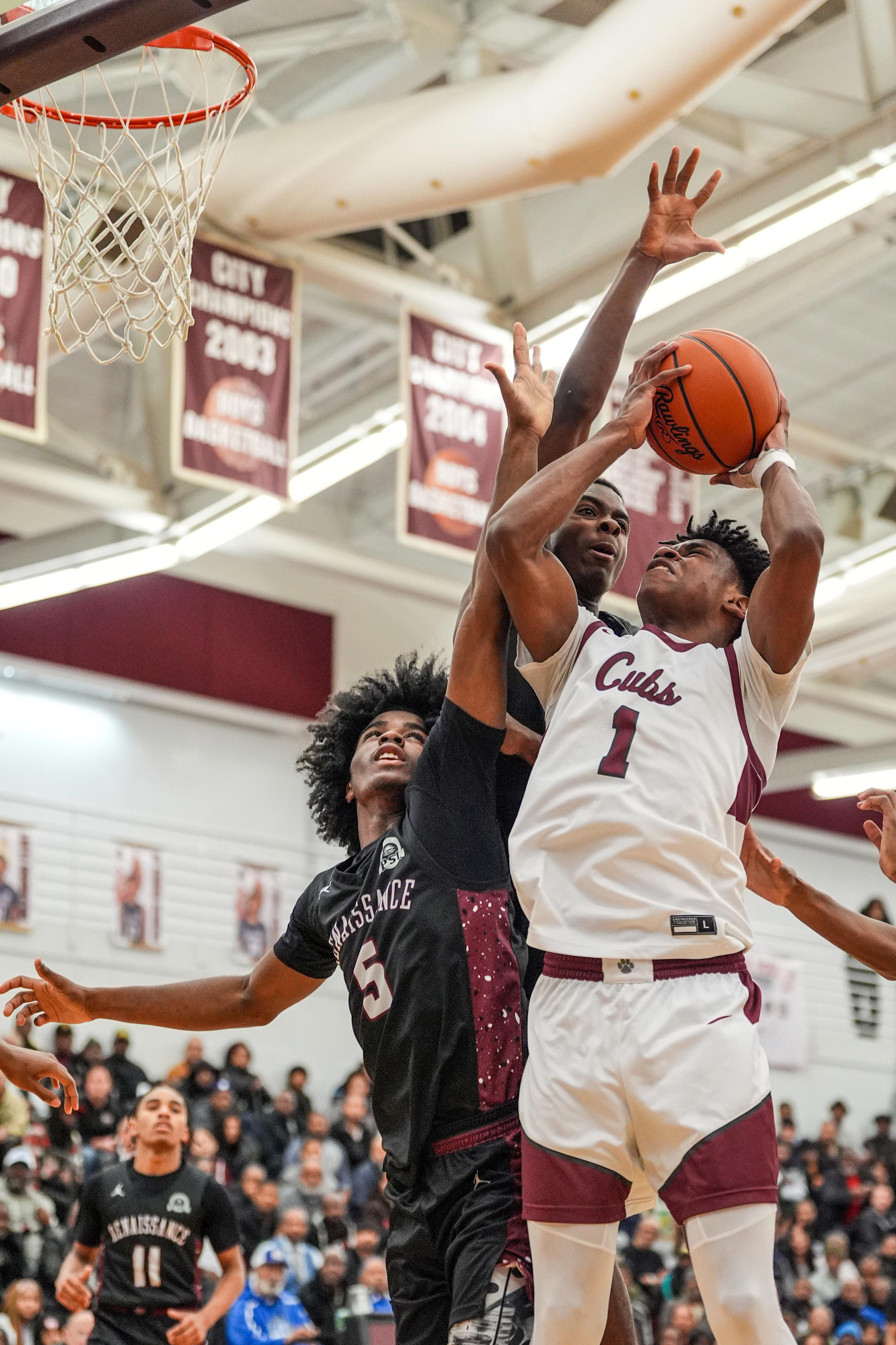 Michigan boys basketball: Xavier Johnson finds new role, leads U-D Jesuit in district final