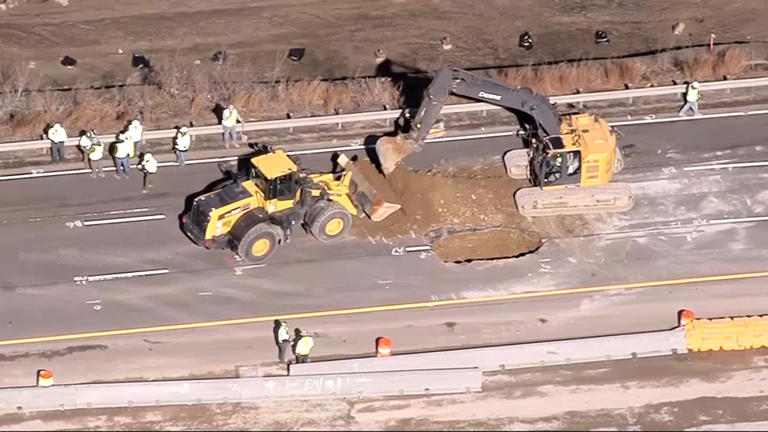 What caused a trench to open on the Mass Pike in Framingham?