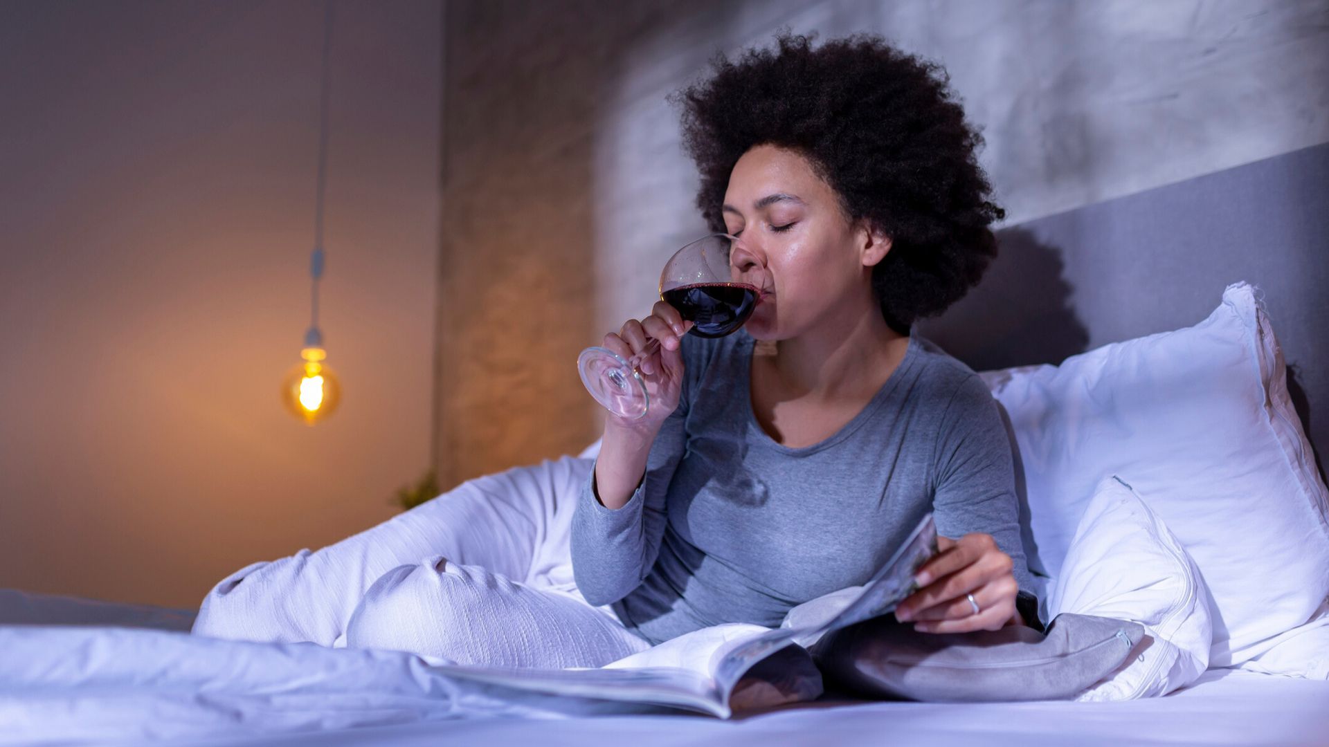 Alcohol doesn't help you sleep better — experts explain what it ...