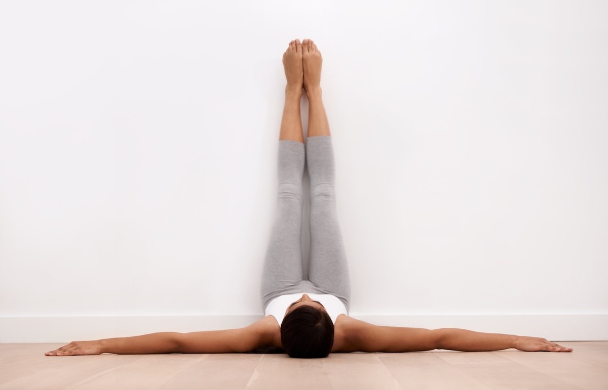 7 Easy Wall Pilates Exercises That'll Tone Your Core in No Time