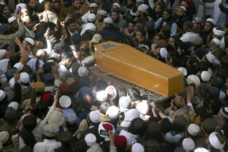 Thousands of mourners attend funeral of Taliban-linked cleric killed in ...