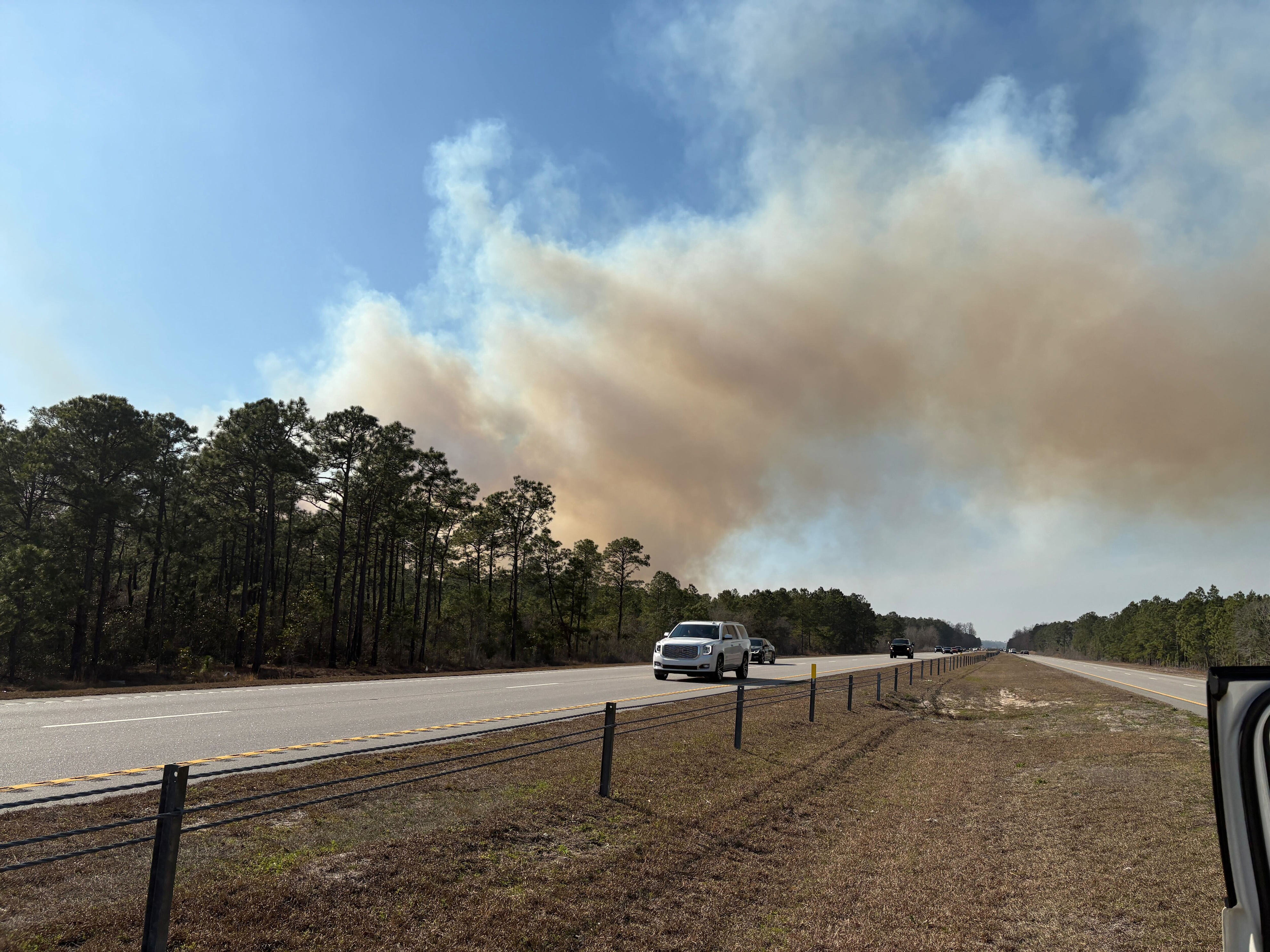 Crews fully contain wildfire near Lewis Ocean Bay Preserve, Highway 90