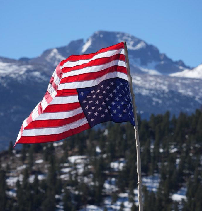 Upside-down American flags hung as hundreds protest US Forest Service ...
