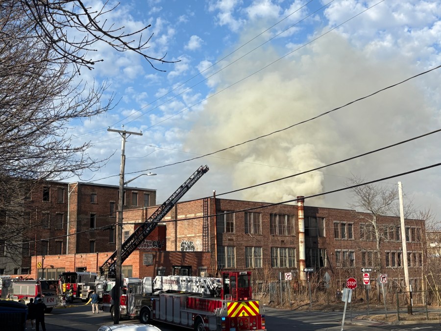 Crews battle fire at abandoned building in Fall River