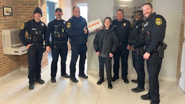 Ohio police donate guitar to 12-year-old who lost money in scam