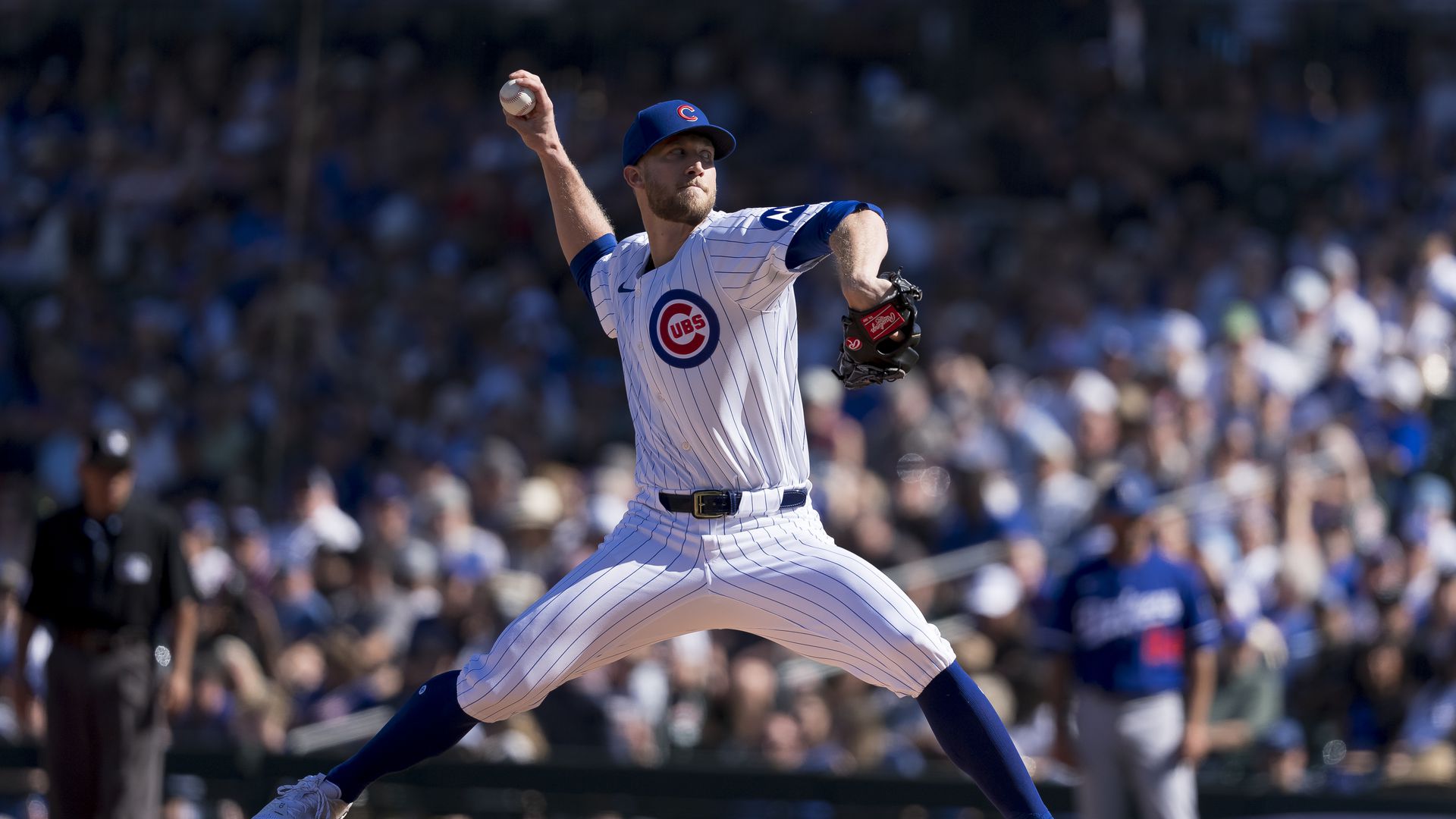 Cubs reduce spring roster to 54