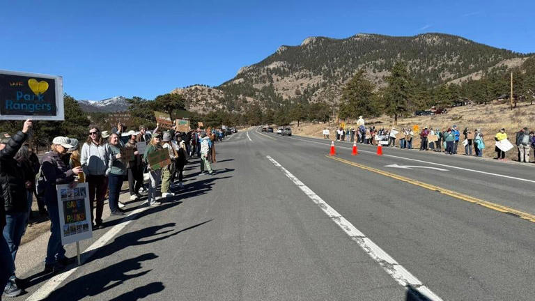 Protesters gather at Colorado's Rocky Mountain National Park as part of ...