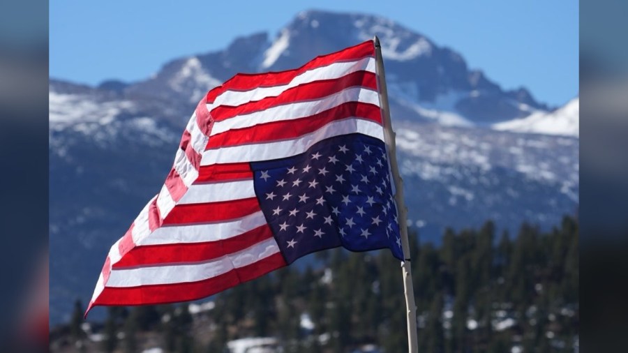 Upside-down American flags hung as hundreds protest US Forest Service ...