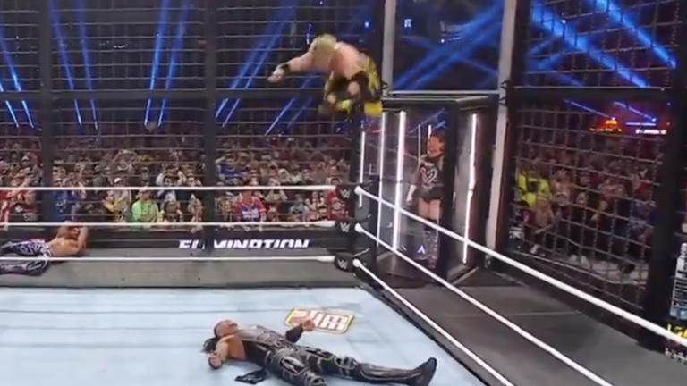 Video: Logan Paul hits insane frog splash, gets knocked out cold by CM Punk at WWE Elimination ...