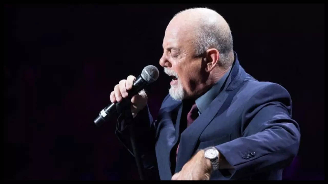 Billy Joel recovers after the fall during Connecticut concert