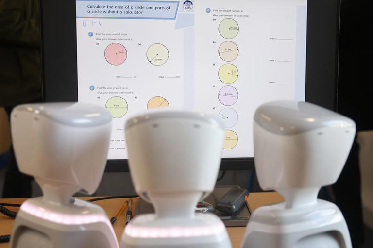 The Greater Manchester school where robots sit lessons and take lunch breaks