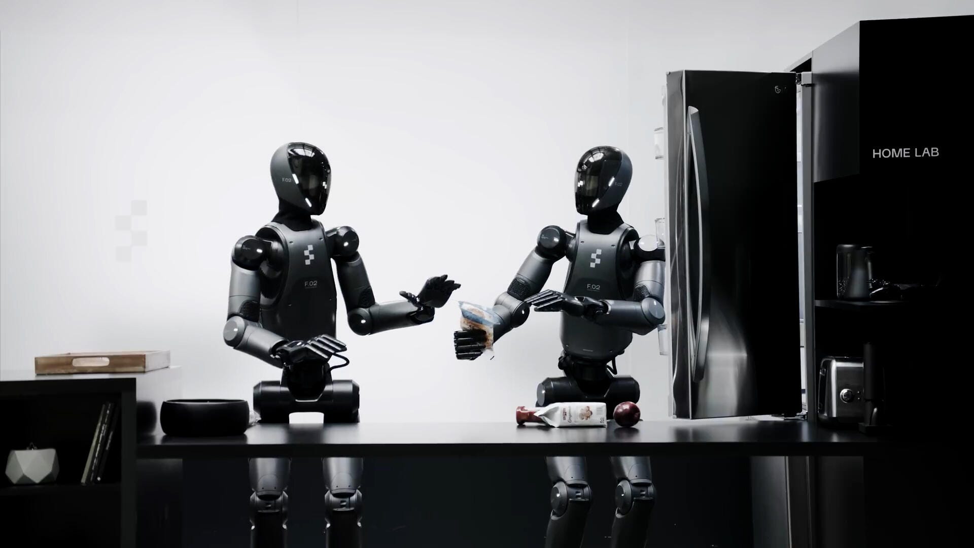 These Humanoid Robots Work Together, Running the Same AI
