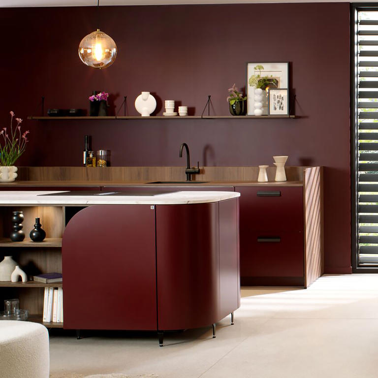 The curved kitchen cabinets in Bridget Jones' eclectic kitchen are ...