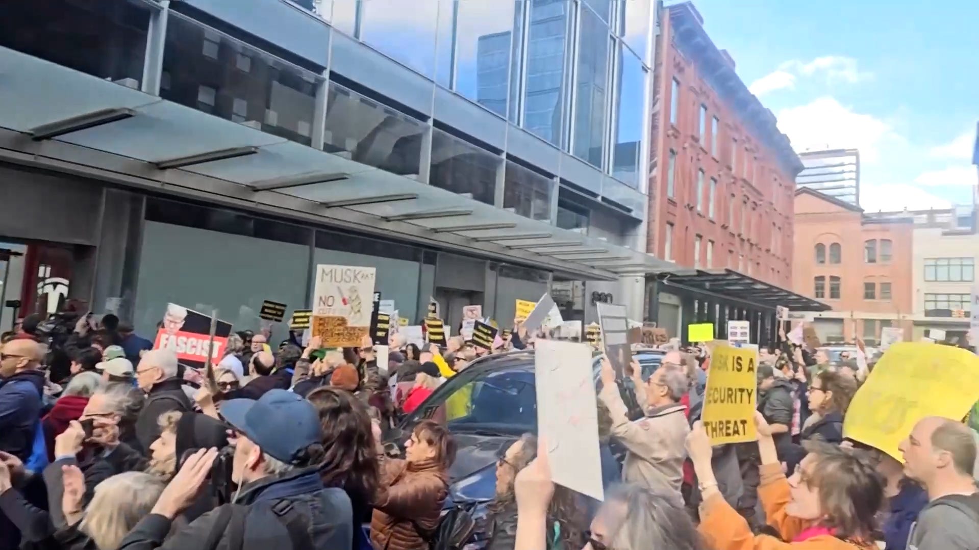 Protesters against Elon Musk organize outside Tesla dealerships across US