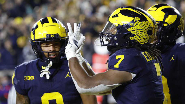 WATCH: Donovan Edwards shows off his strength and soars to top of the ...