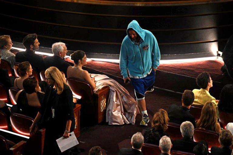Adam Sandler 'storms out' of Oscars after he's mocked over outfit