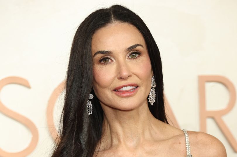 Demi Moore, 62, shows off ageless beauty in low-cut gown on Oscars red ...