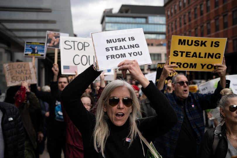 Hundreds protest Elon Musk in New York outside a Tesla dealership, 9 ...