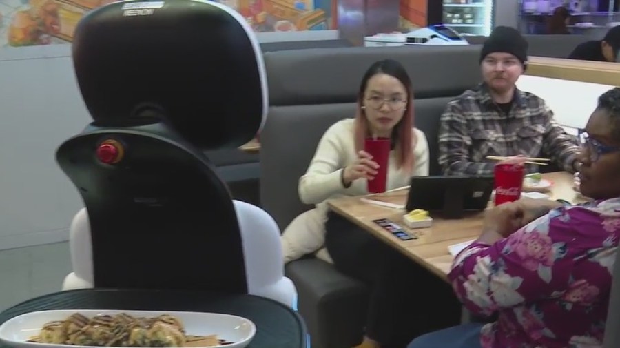 Triad restaurant arrives with robot waiters, mini bullet trains