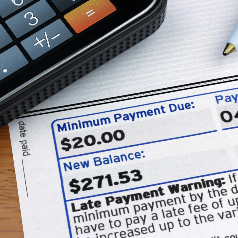 What is the minimum payment trap (and how does it affect your finances)?
