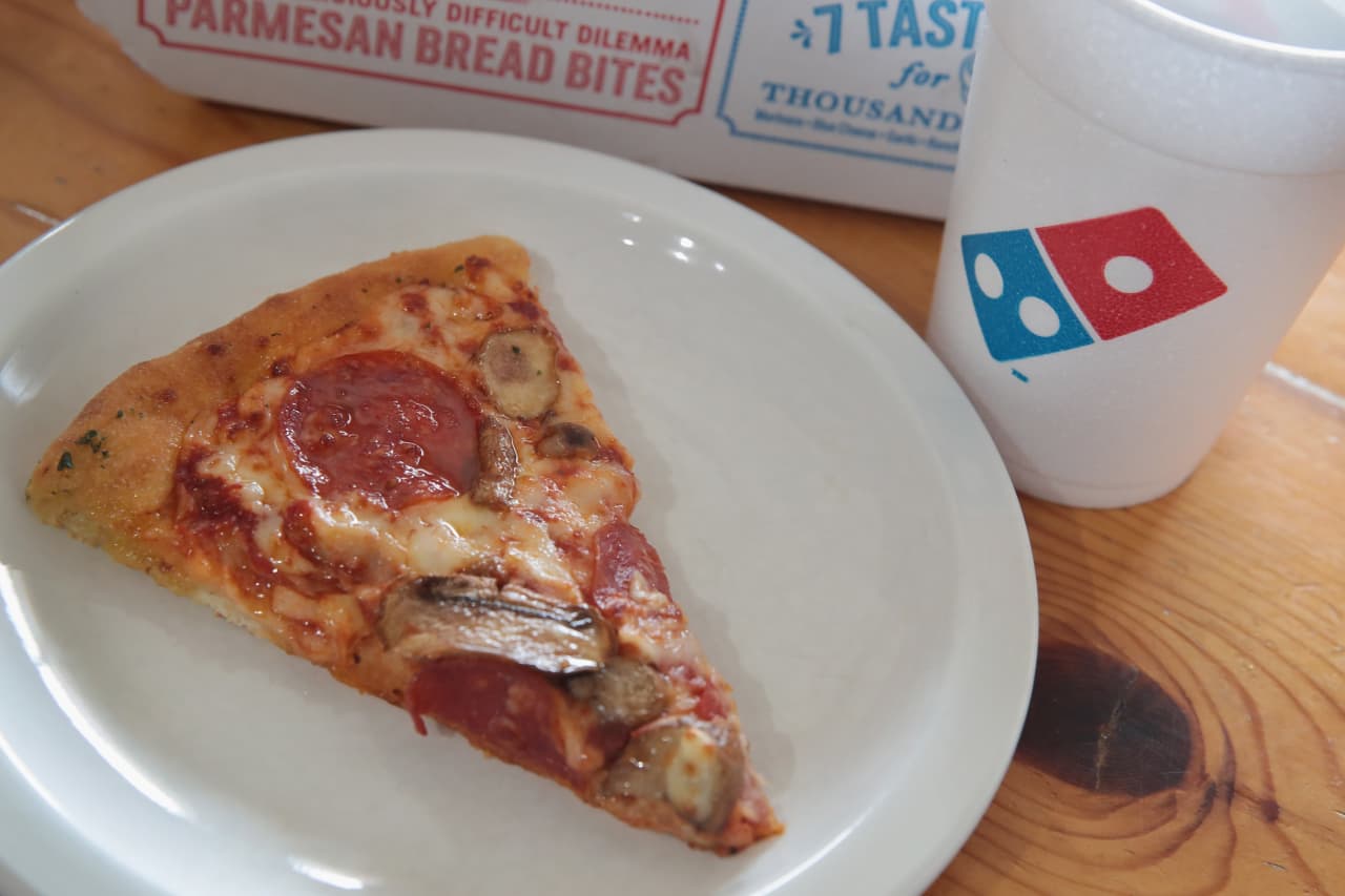 Domino’s Stock Rises. The Pizza Chain Is Stuffing Its Crusts.
