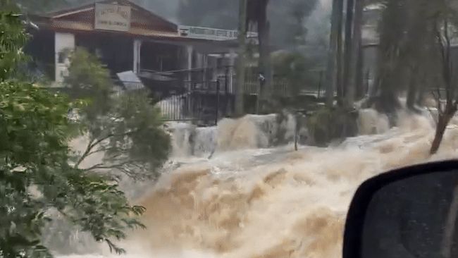 Motorists Shocked as Road Transforms Into Waterfall During Alfred Aftermath