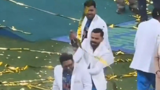 Virat Kohli pours champagne on Rishabh Pant but gets attacked from behind by Harshit Rana in ...