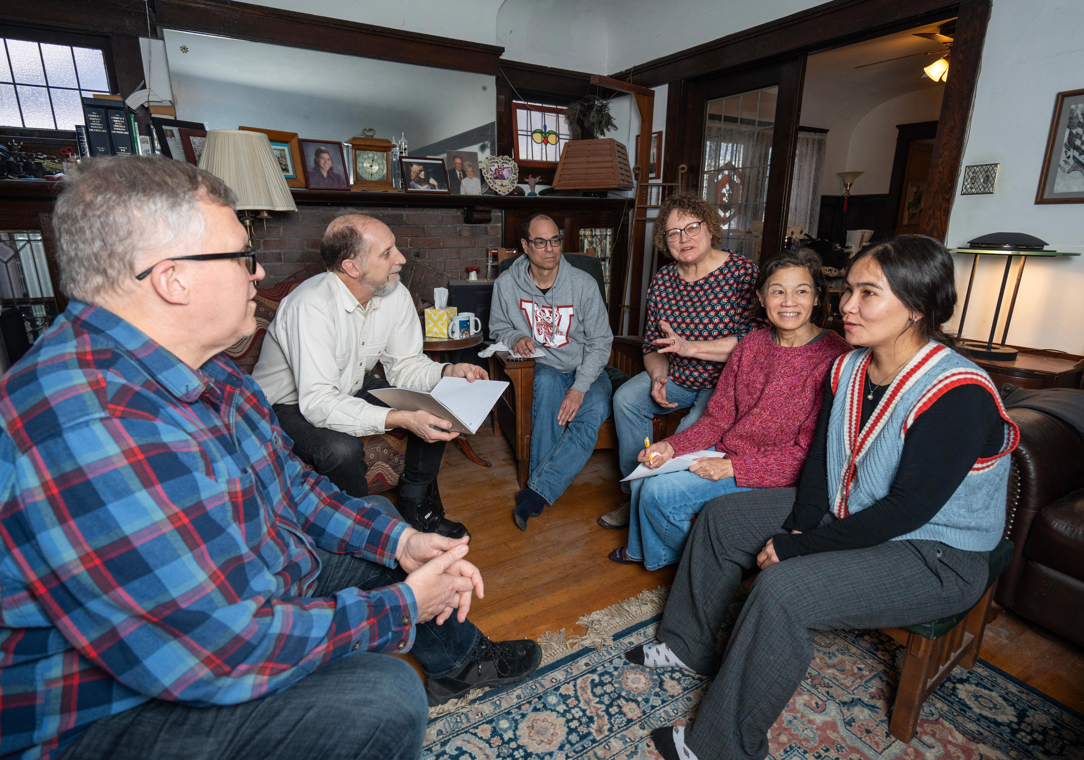 Inches from resettling, an Afghan refugee family looks to Wisconsin ...