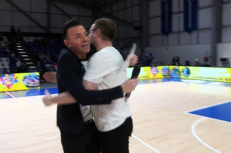 Stunned radio DJ Des Clarke hugs Caledonia Gladiators fan after ...
