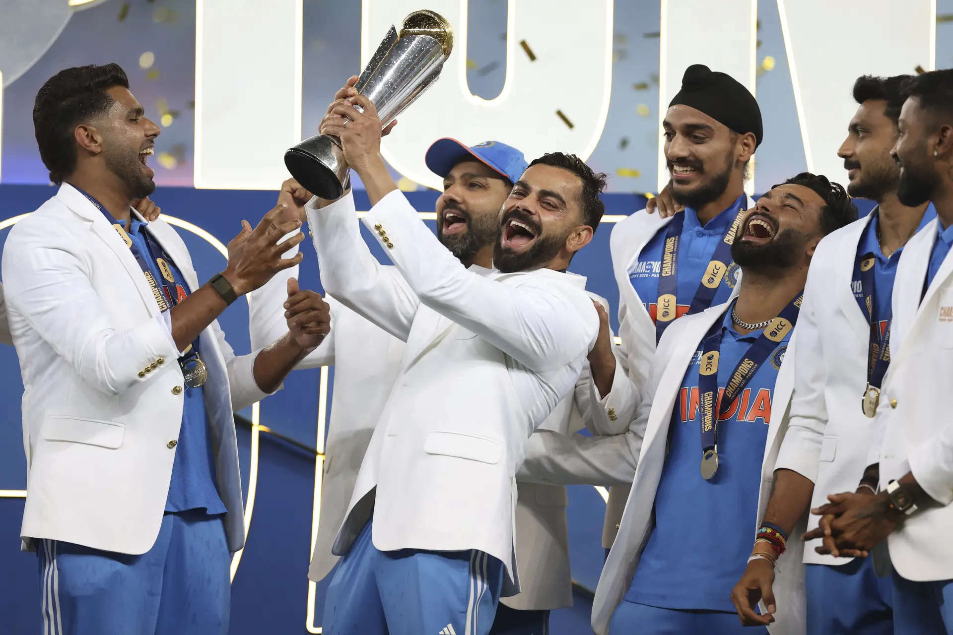 Why do Champions Trophy winners wear white jackets?