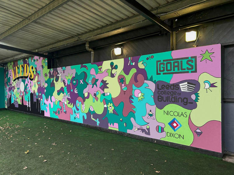 Painting & Decorating students tackle striking football mural