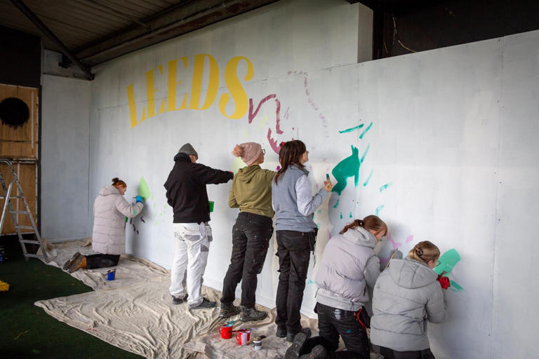 Painting & Decorating students tackle striking football mural