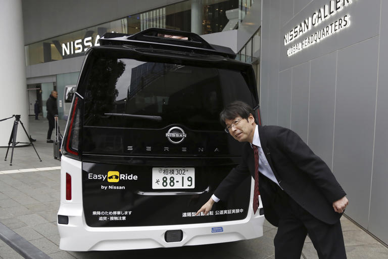 Japan's Nissan tests driverless vehicles in city streets filled with ...
