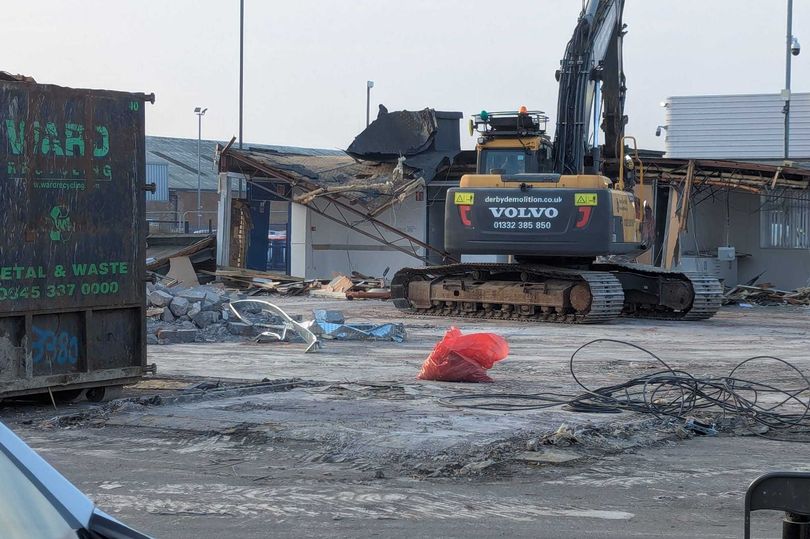 Demolition at Pentagon Island as building hit by storm damage
