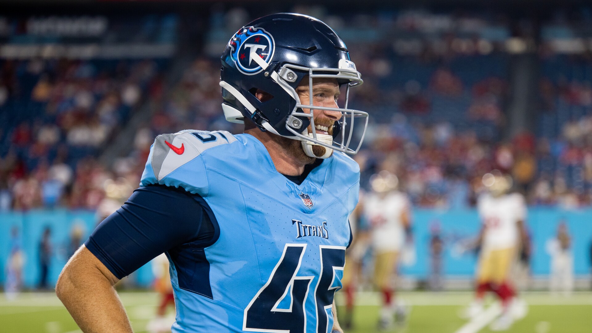Titans bring back LS Morgan Cox