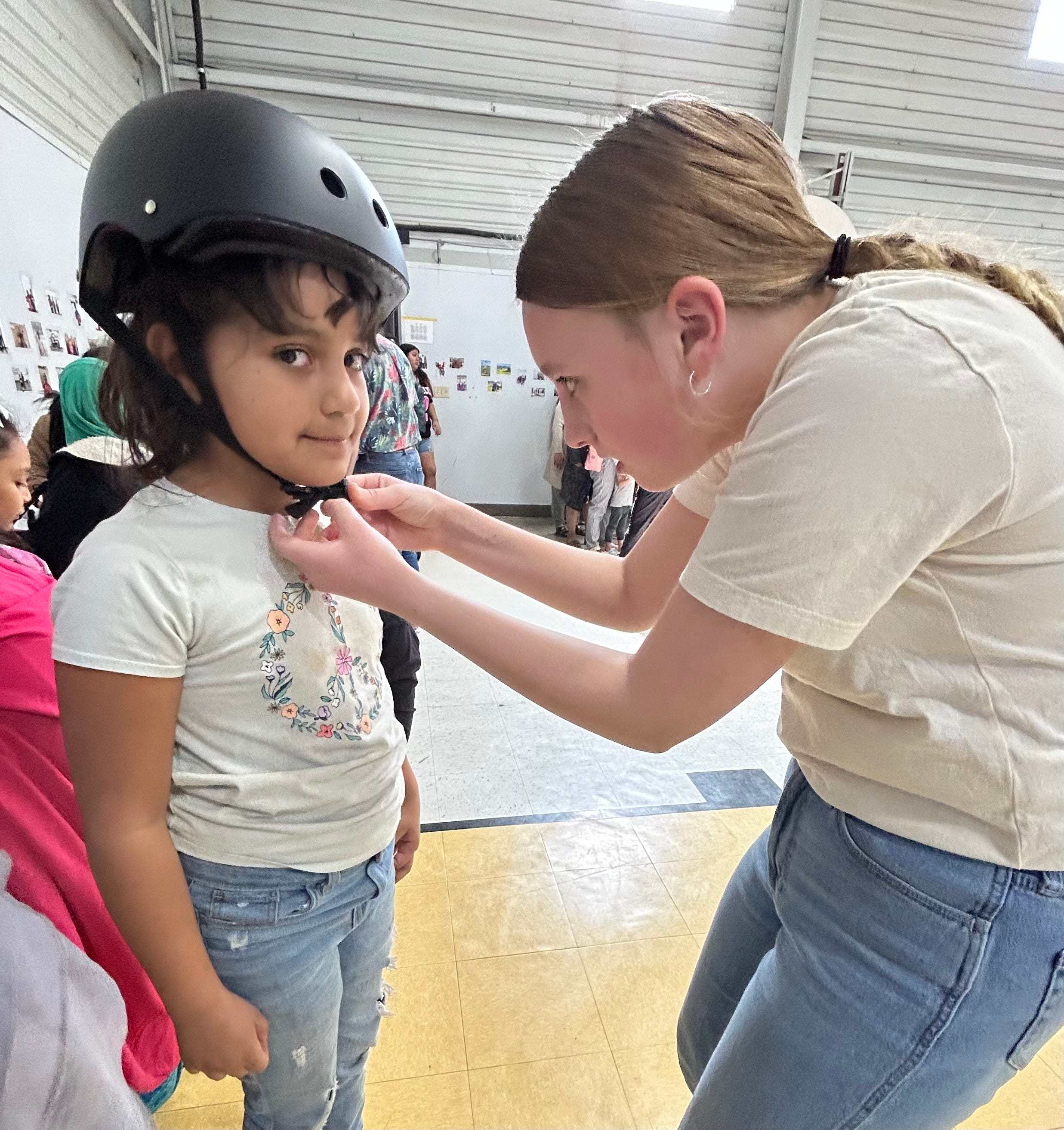 Bicycles built by students bring smiles to Eastridge second-graders