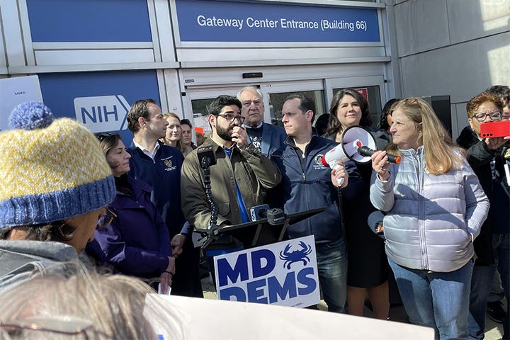 Scientists, Supporters Rally Against NIH Dismissals, Budget Cuts