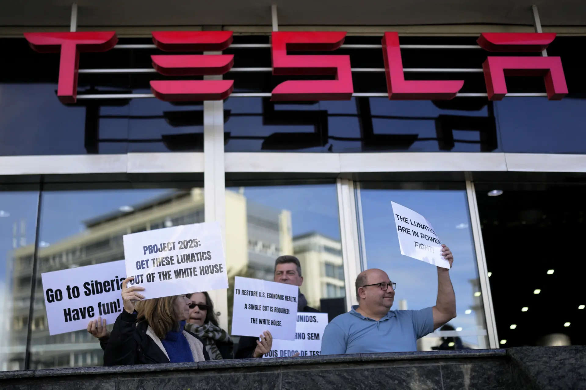 Elon Musk backlash reaches breaking point as protesters target Tesla ...