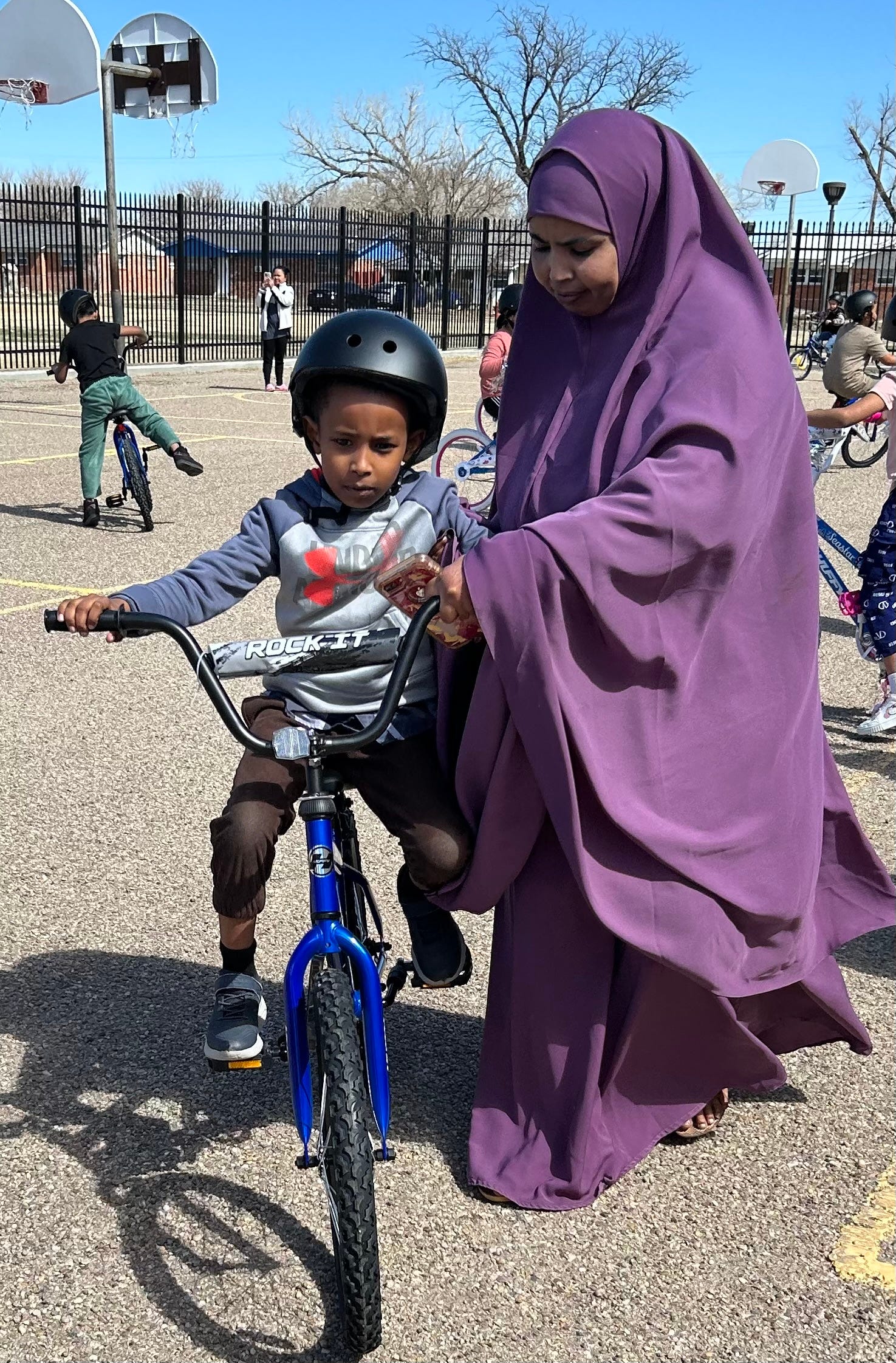 Bicycles built by students bring smiles to Eastridge second-graders
