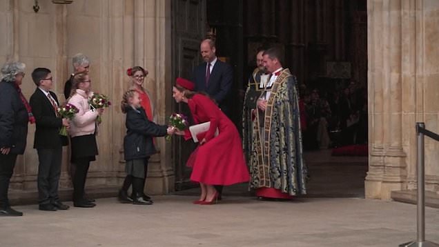 Moment little girl hands Kate flowers at the Commonwealth Service