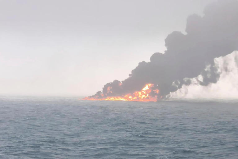 A cargo ship hits a tanker and they catch fire off England. The crew ...