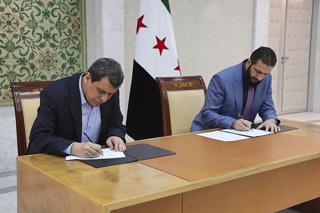 Syria's government signs a breakthrough deal with Kurdish-led ...