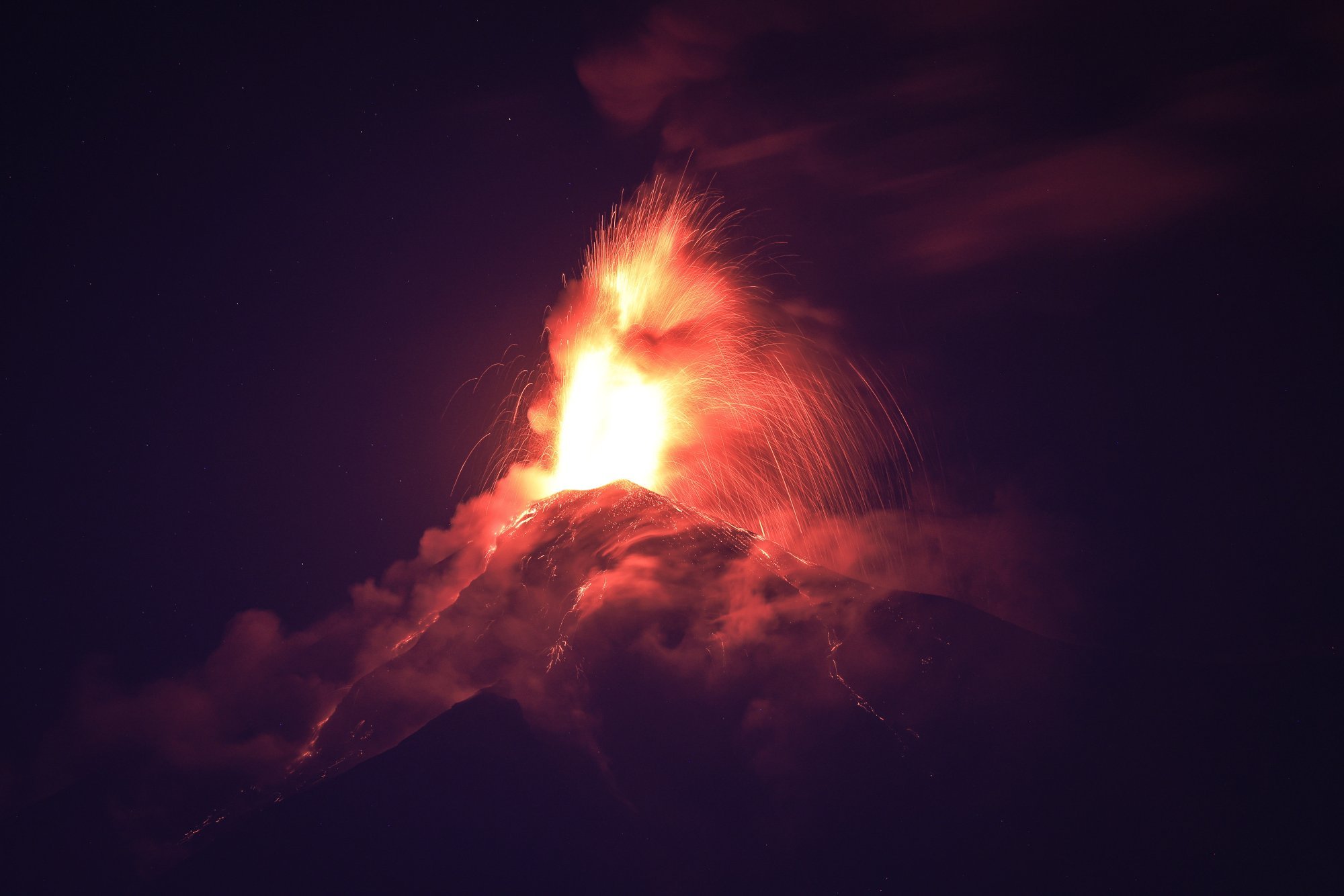 Guatemala’s Volcano of Fire spews lava and rocks, forcing many to flee